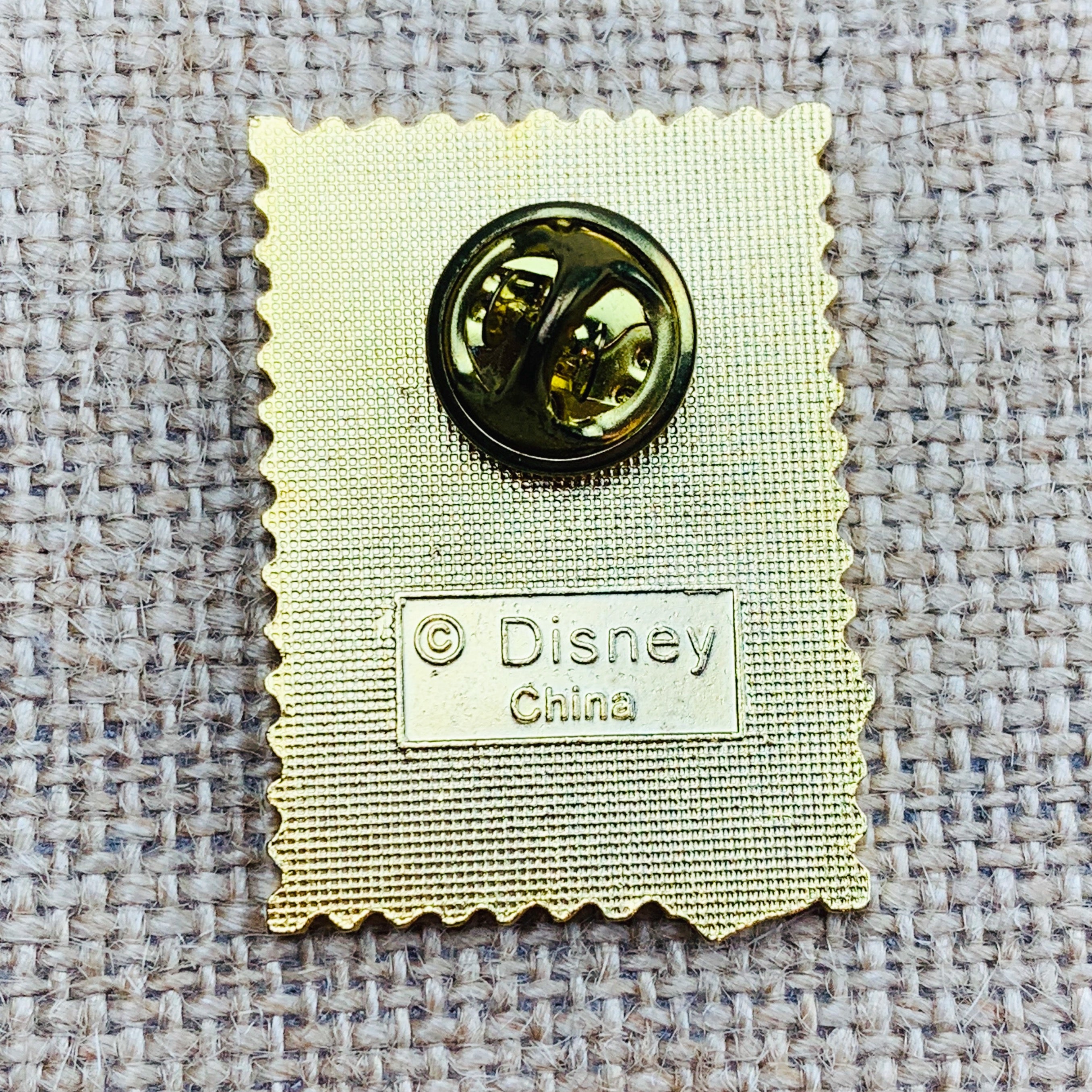 Disney United Kingdom Daisy Stamp Pin – The Stand Alone